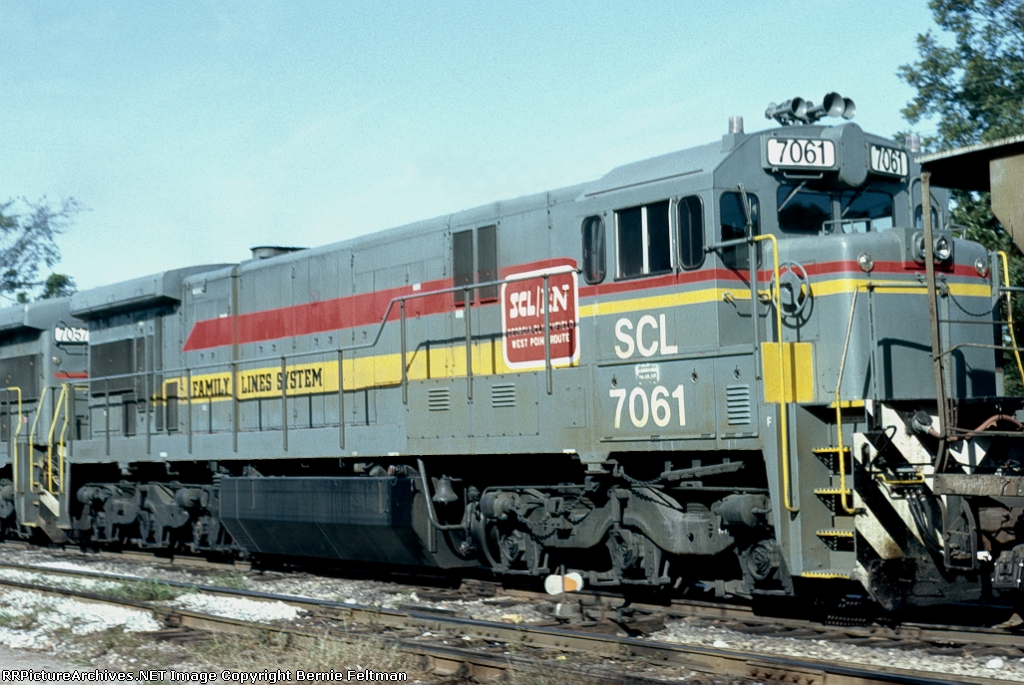 Seaboard Coast Line C30-7 #7061, as the trailing unit on a Florida-Kentucky hopper train,